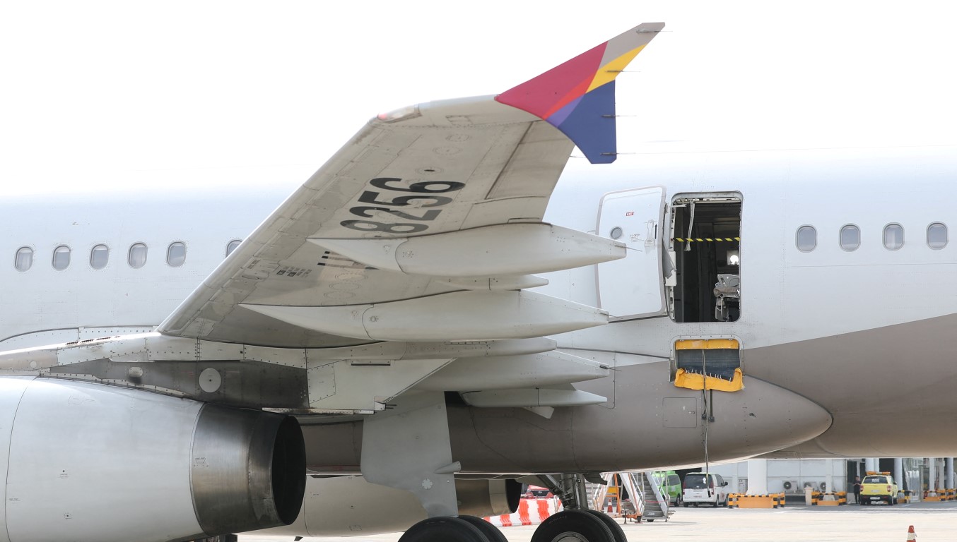 Passenger opens plane door during South Korea flight | Otago Daily ... Passenger opens plane door during South Korea flight | Otago Daily ...
