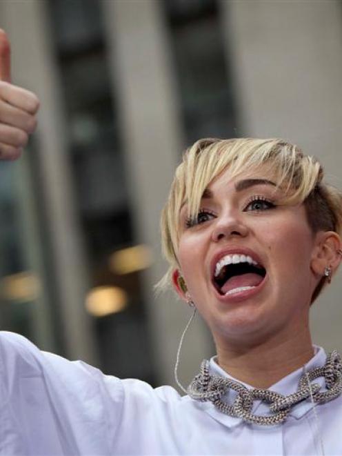 Miley Cyrus grabs double top slot in UK charts | Otago Daily Times ...