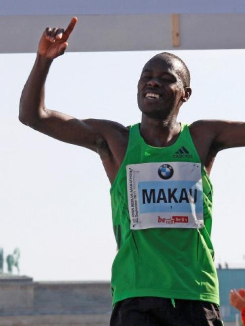 Athletics: Kenyan claims marathon world record | Otago Daily Times ...